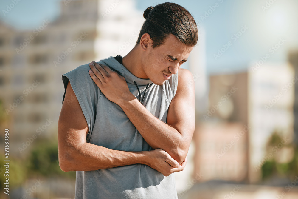 Fitness, shoulder pain and man with injury after workout, exercise or ...