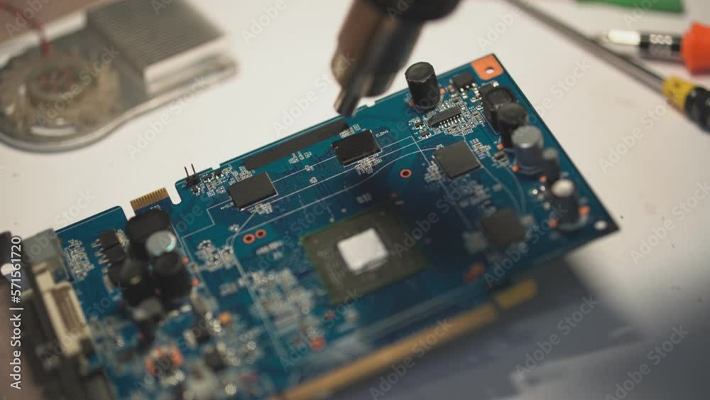 repair of a video card using a soldering station. replacement of a ...