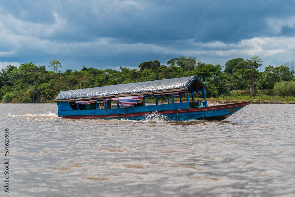 Poster A motorized wooden boat underway on the Amazon River – Wall Art ...