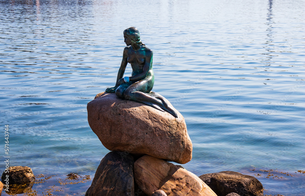 Copenhagen, Denmark. The little mermaid sits on the stone. Stock Photo ...