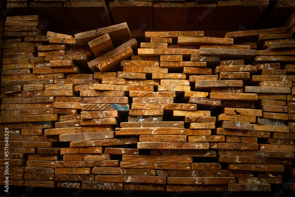 Teak wood,teak wood stump in the sawmill on low light indoor,Piles of ...