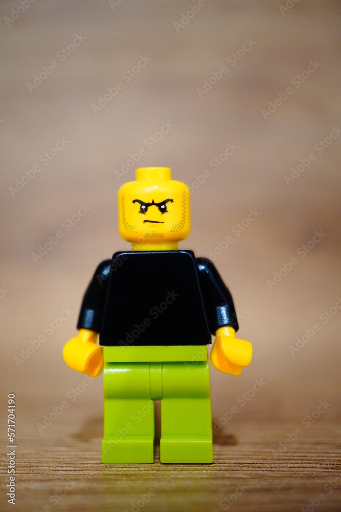 Lego man figurine with angry expression. Stock Photo | Adobe Stock