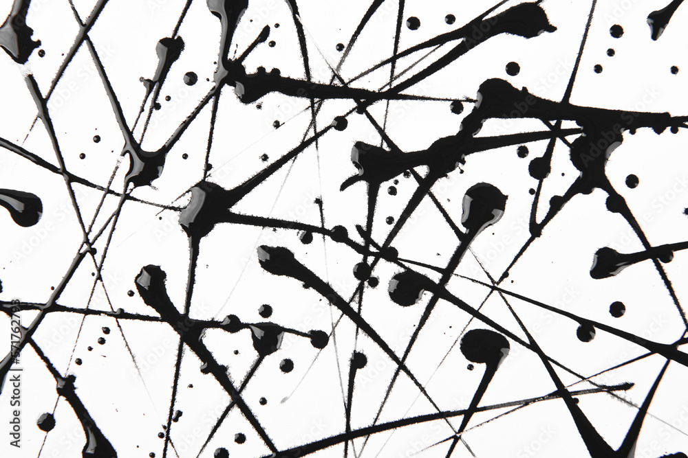 Abstract black ink paint splash on white background.splashes and drops ...