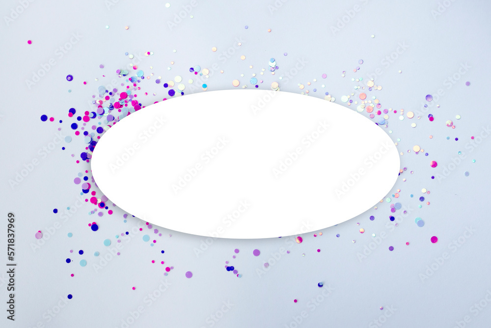 Blank oval card and pink and purple confetti. Template layout. Top view ...