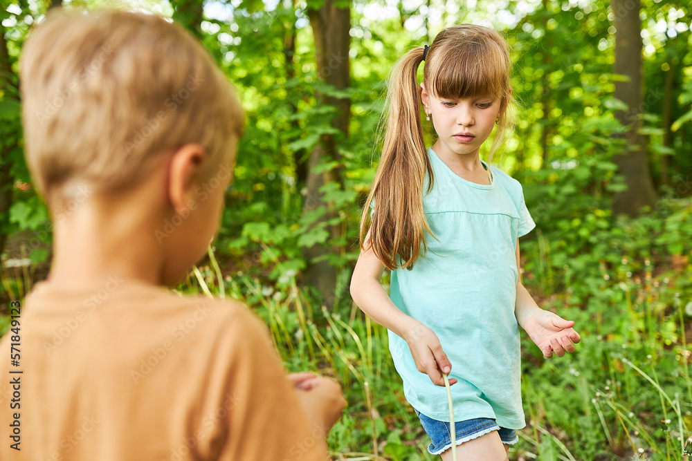 Brother and sister exploring forest together during vacation Stock ...