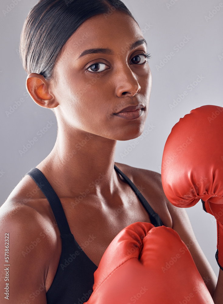 Boxer, gloves and portrait of woman in studio for sports exercise ...