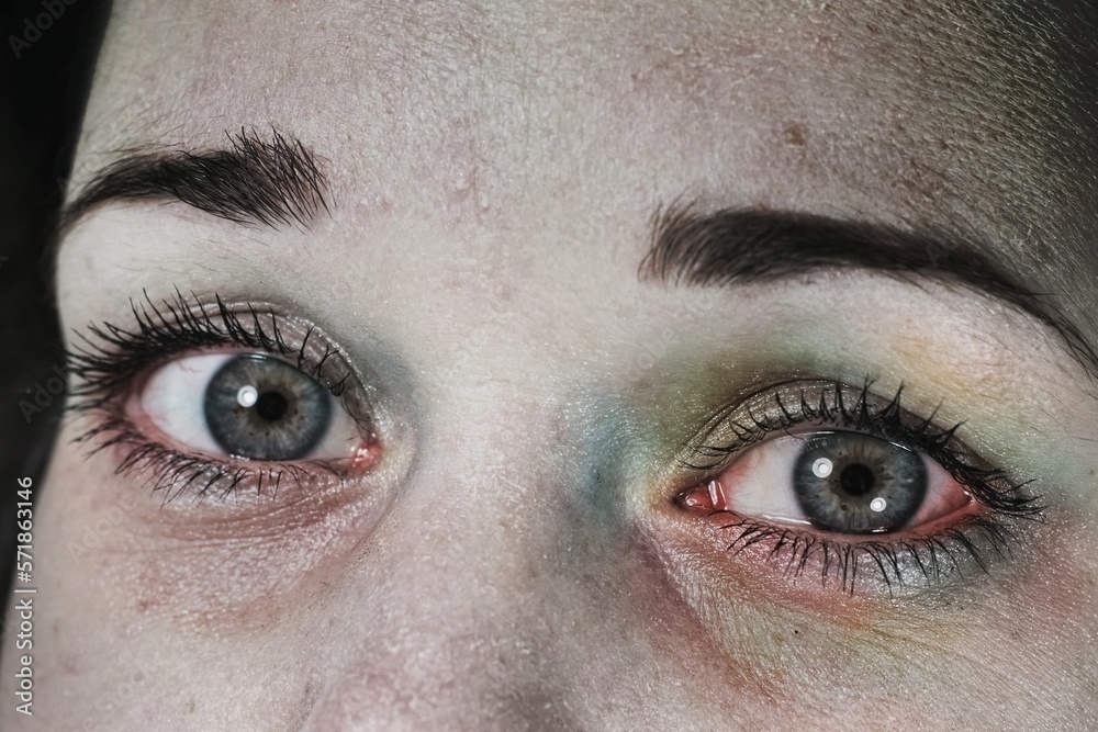 Violence against women. Eyes of scared and desperate woman with ...