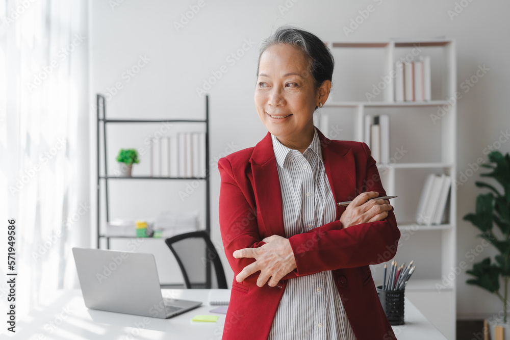 Asian elderly older female mature business woman in formal suit stock ...
