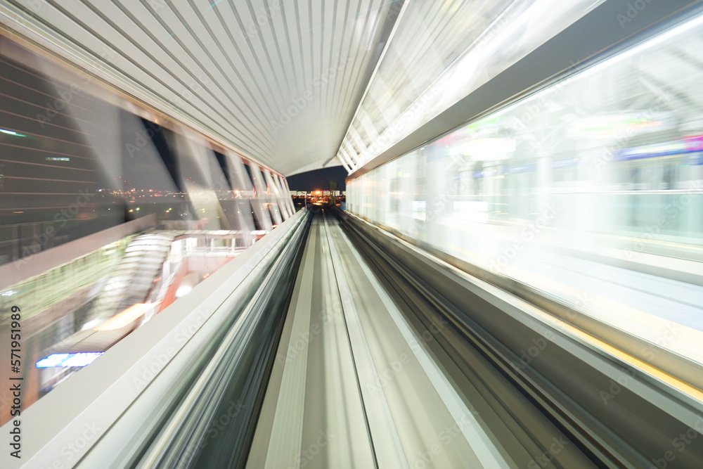 Motion blurred of train moving inside tunnel with daylight in tokyo ...