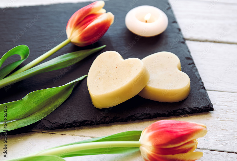 Homemade solid moisturizing hand cream. Heart shape cream bar made of ...