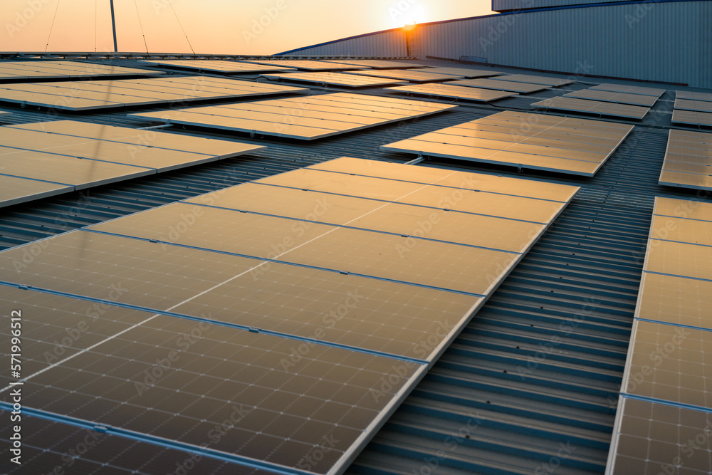 Solar cell farm power plant and solar panels with sunset in evening ...