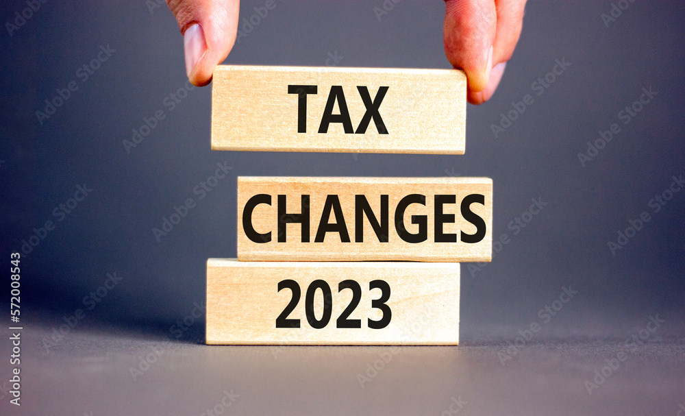 Tax changes 2023 symbol. Concept words Tax changes 2023 on wooden ...