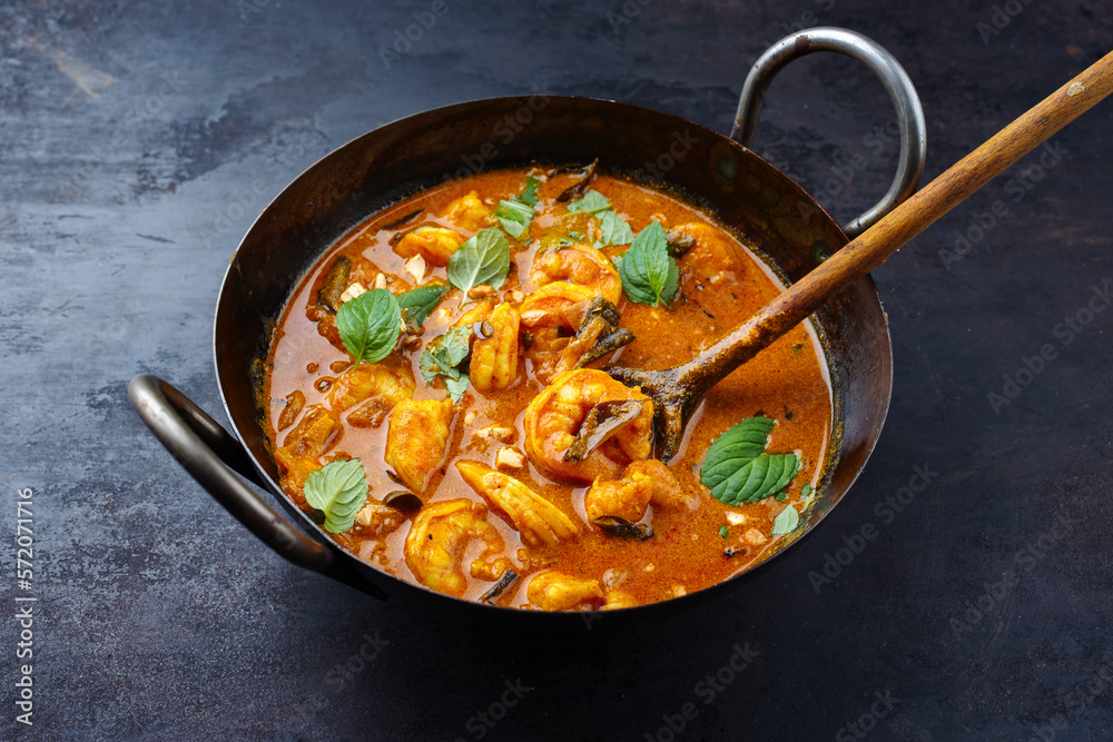 Traditional spicy Indian prawn Madras curry Rogan Josh with king prawns ...