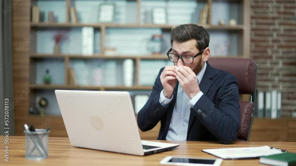 Video Stock Sick business man investor blowing running nose sneeze and ...