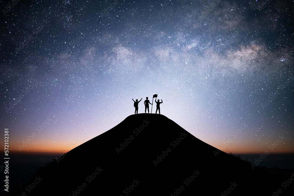 Together overcoming obstacles as a group of three people raising hands ...