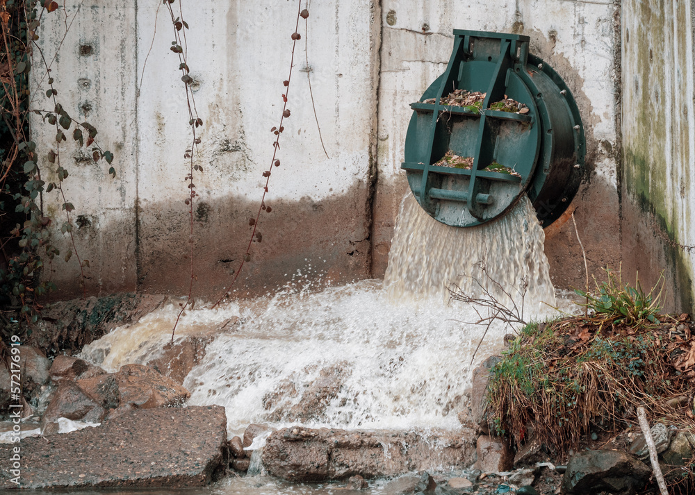 Rainwater outflows through flood drainage system, Water runoff from ...