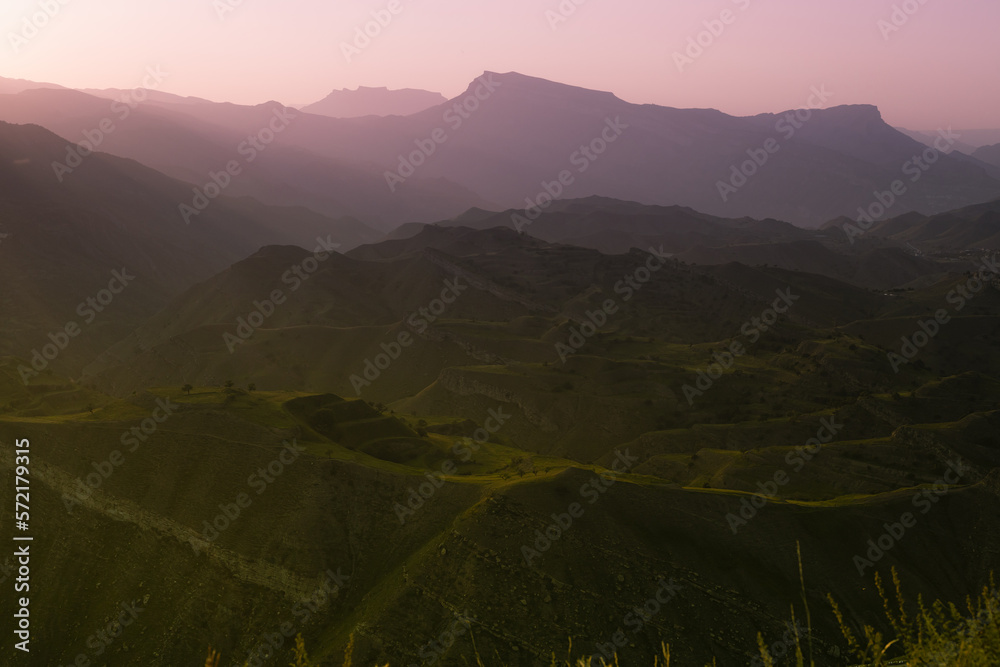 Magnificent mountain landscape with panorama view on lush green ridges ...