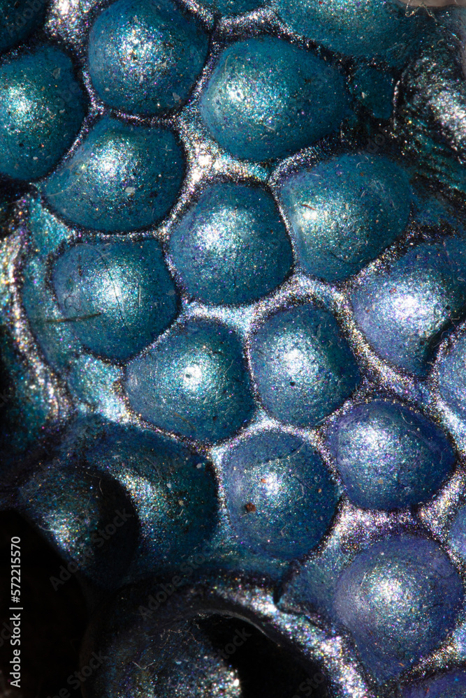Alien trypophobia holes in a shiny sci-fi close up background Stock ...