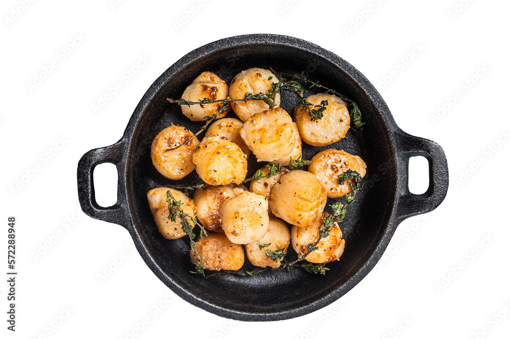 Scallops seared in garlic, thyme and butter served in cast iron skillet ...