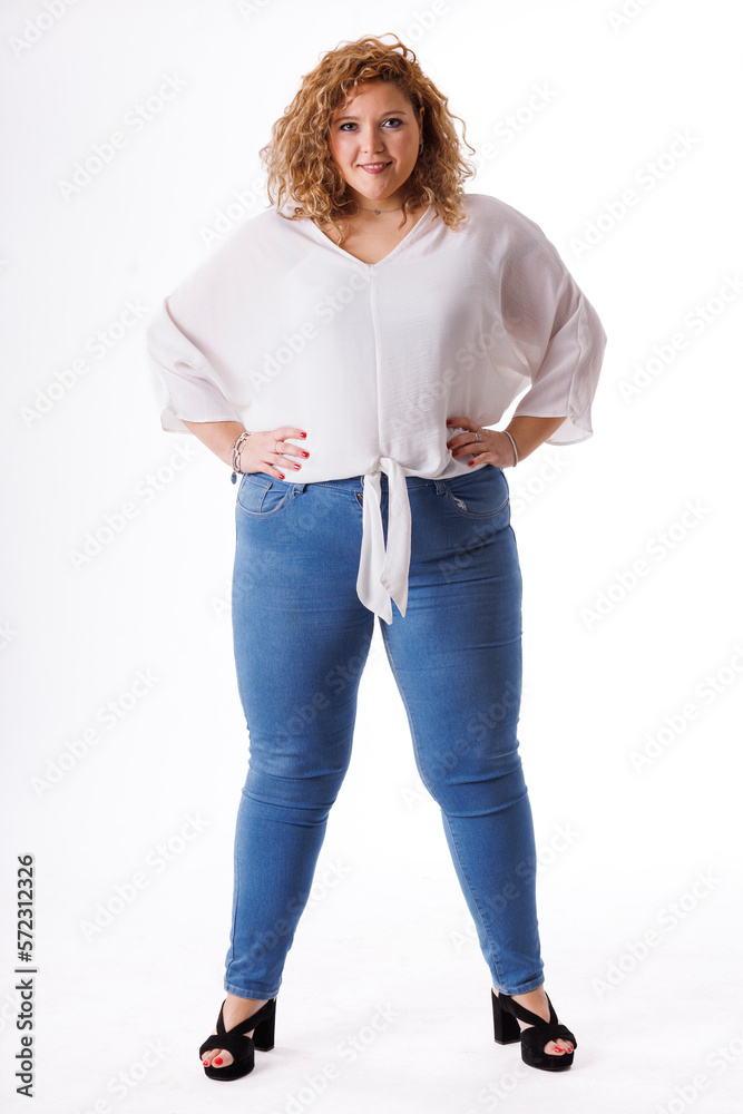Plus size fashion model, fat woman in denim clothes and white shirt on ...