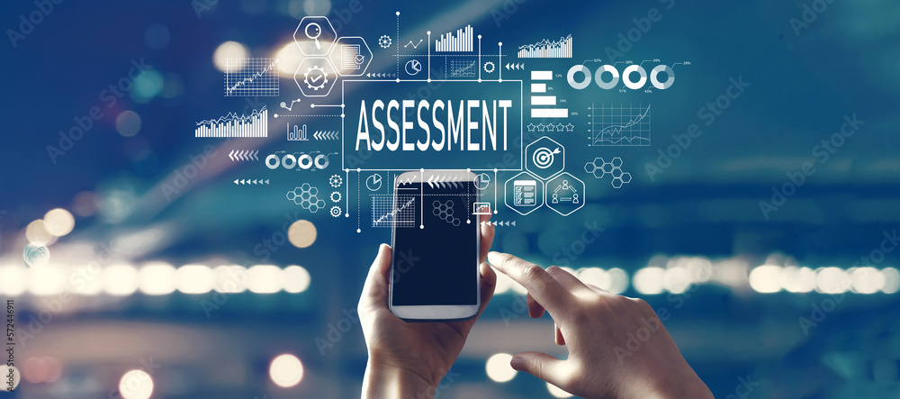 Assessment concept with person using a smartphone Stock Photo | Adobe Stock