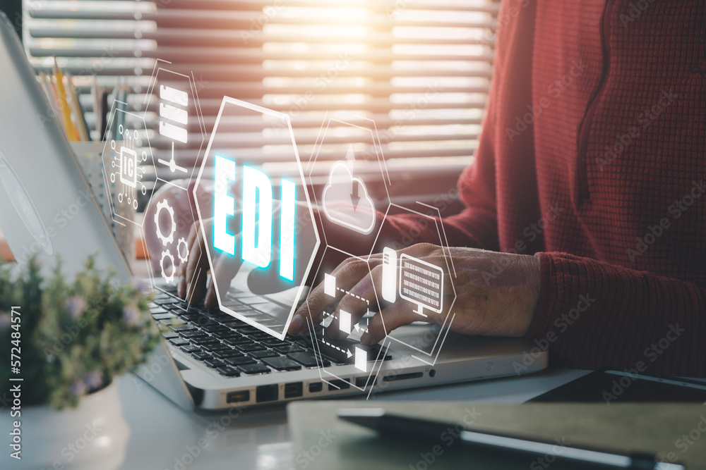 EDI-electronic data interchange concept, Person using computer on ...