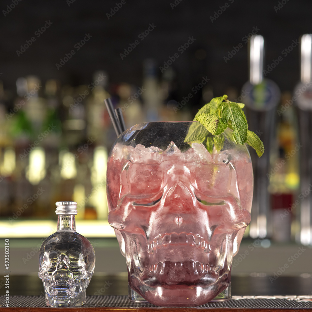 skull shaped vodka cocktails on a bar counter in italy Stock Photo ...