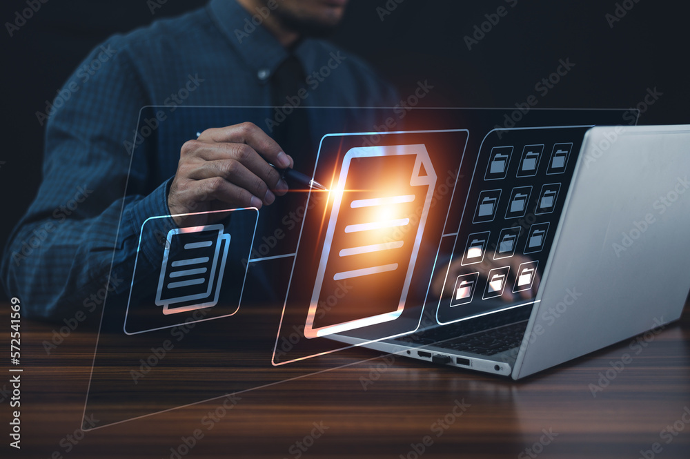 Businessman using computer for DMS documents management and ERP ...