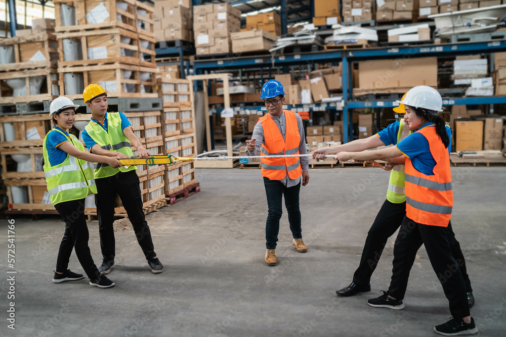 Group of industrial warehouse asian engineer or worker in safety suite ...