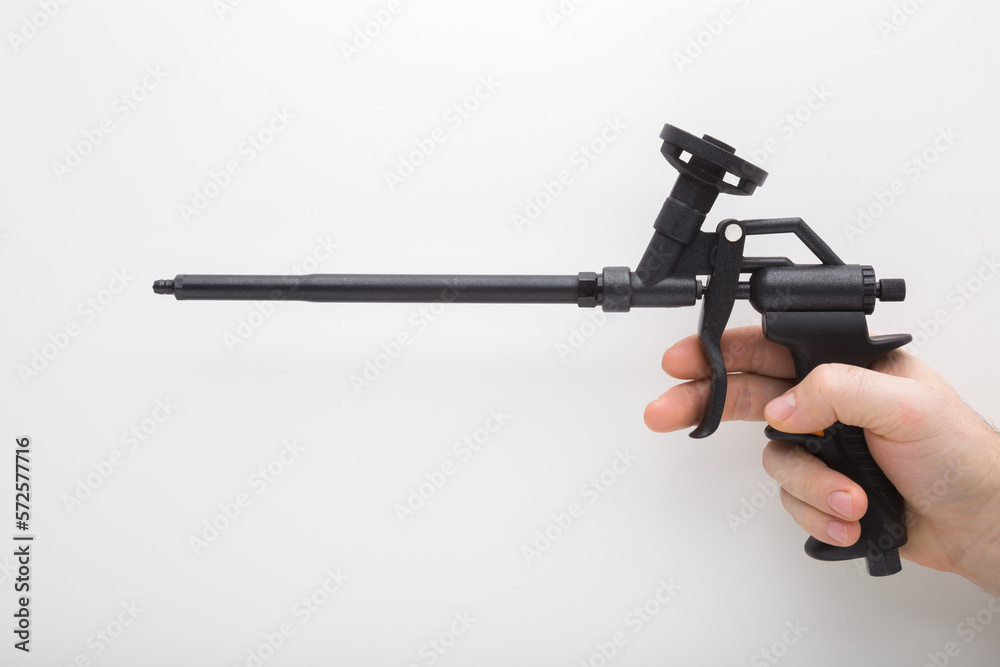 Young adult man hand holding and showing dark black professional foam ...