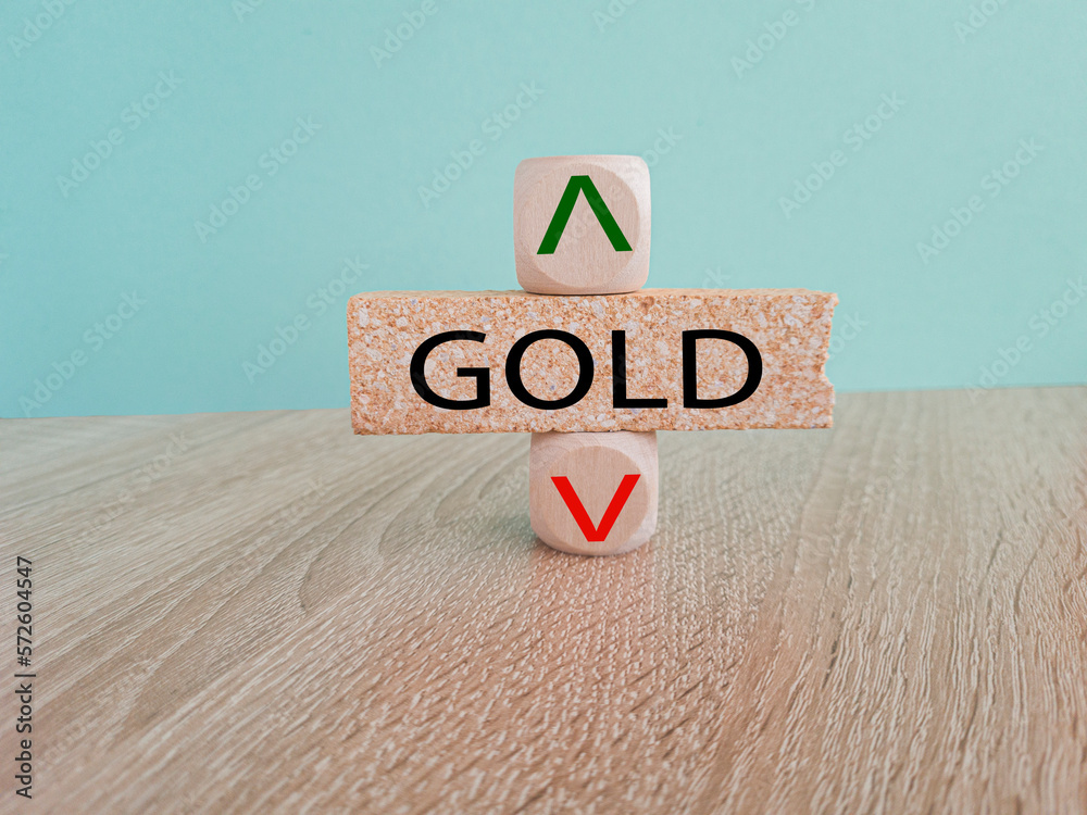 Gold price symbol. A brick block with arrow symbolizing that Gold price ...
