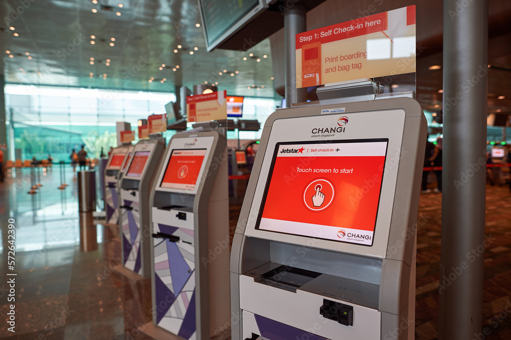 SINGAPORE - CIRCA NOVEMBER, 2015: self-check-in kiosks at check-in area ...