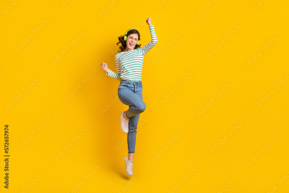 Full size photo of ecstatic woman dressed striped shirt jeans shoes ...