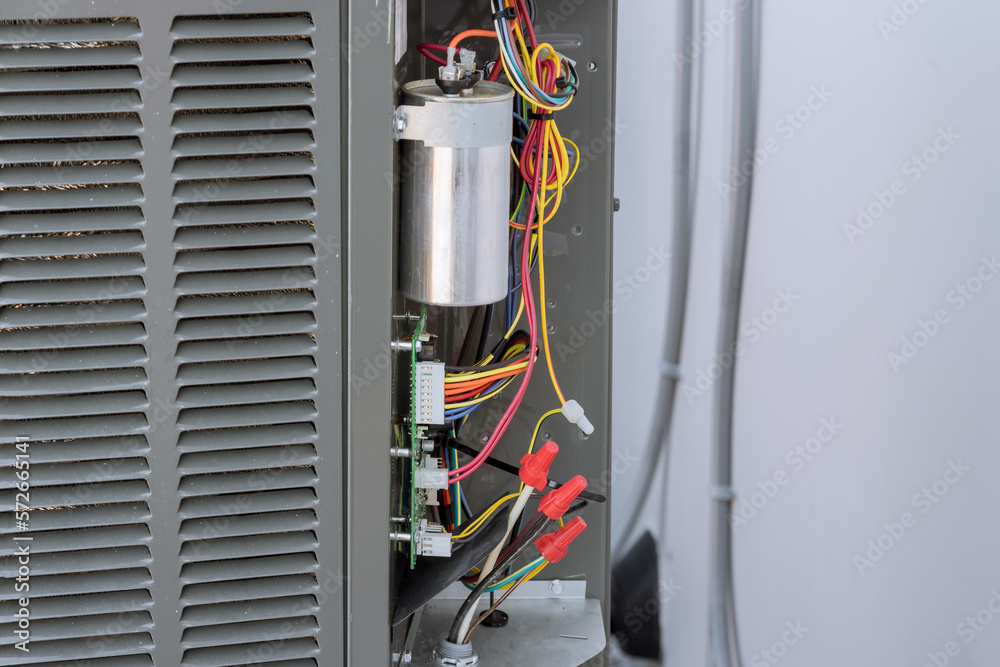 Outside air conditioning system unit installed on exterior facade of ...