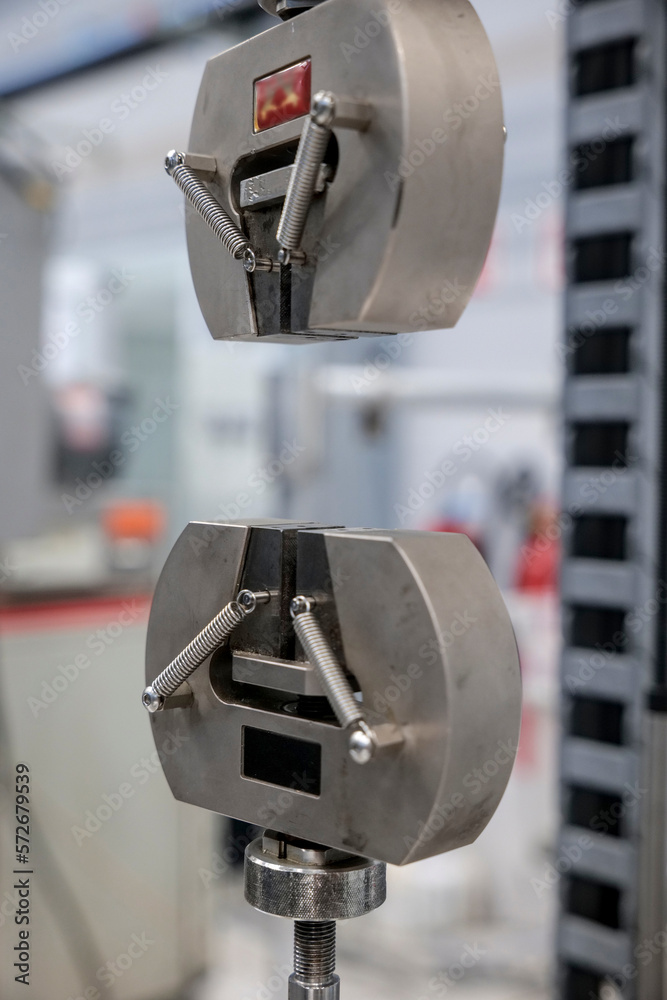 Grips of a tension test bench, for mechanical properties determination ...