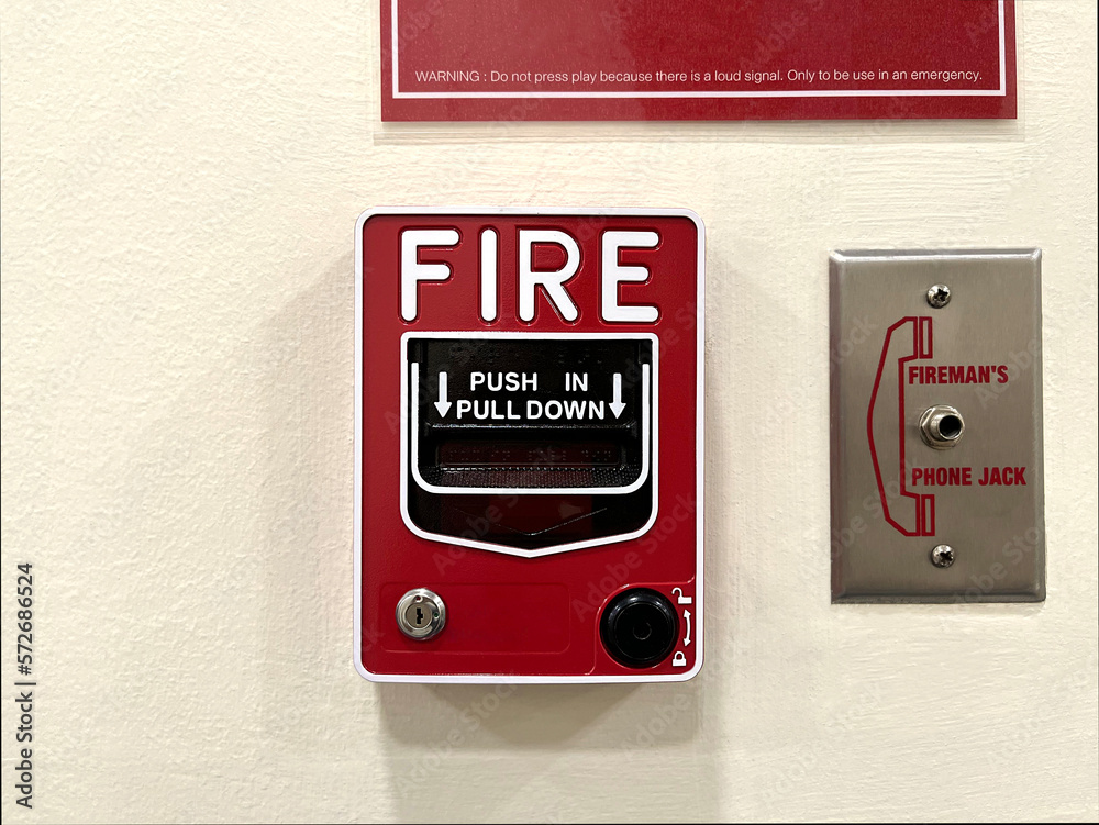fire alarm system on the ivory cement wall background in the hospital ...