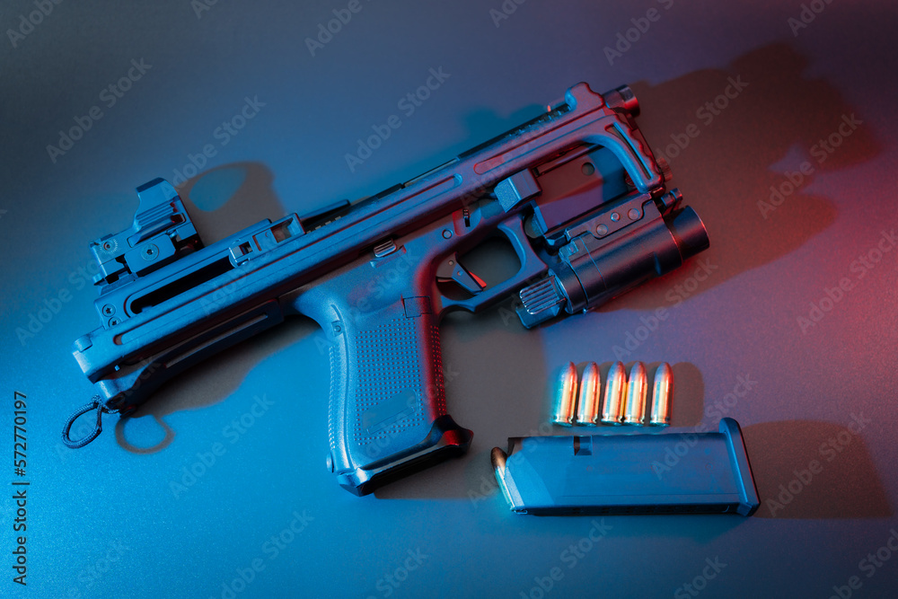 Firearms. Tactical 9mm pistol with folding stock. Stock Photo | Adobe Stock