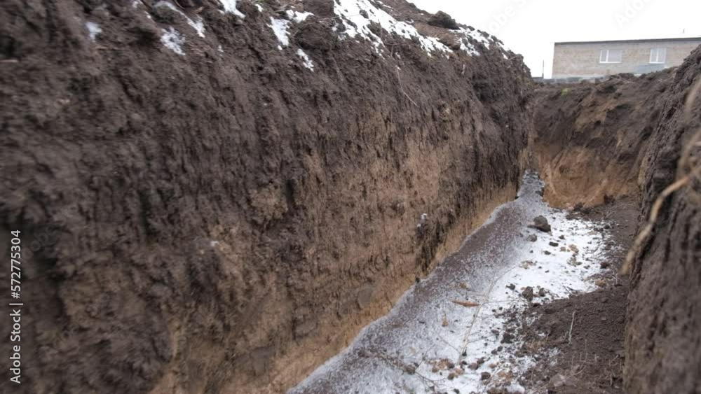 The movement of the bottom of the earth trenches that the excavator dug ...