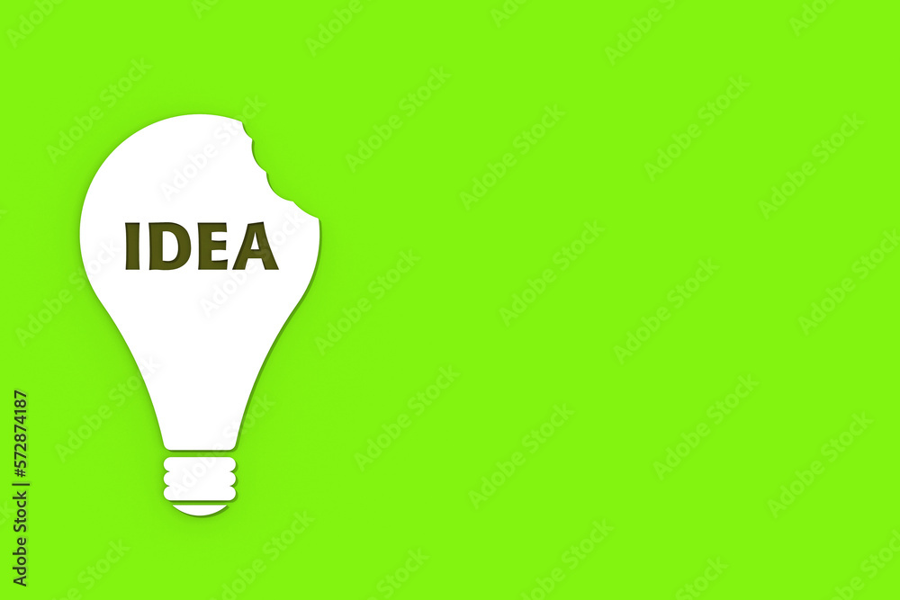 a white bitten light bulb with the inscription idea on a green ...