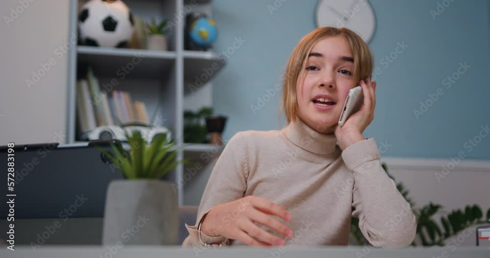 Gorgeous 10 years old schoolgirl answers the call phone sitting the ...
