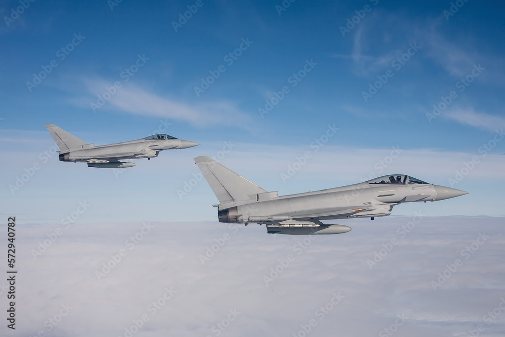 Typhoon Fighter Jet in Flight. Action photograph of Fast Jet military ...