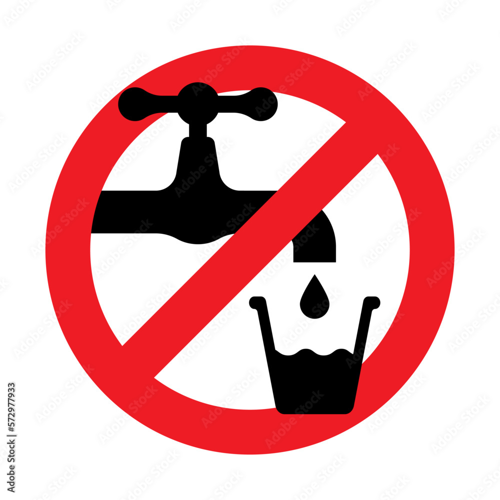 Not to drink water. Red prohibition sign. A water faucet, a glass of ...