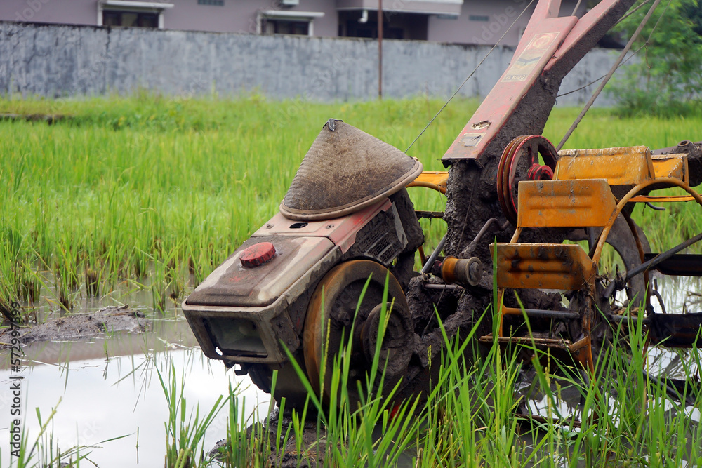 dirty looking ploughing tractor full of mud and rusty wheels Stock ...