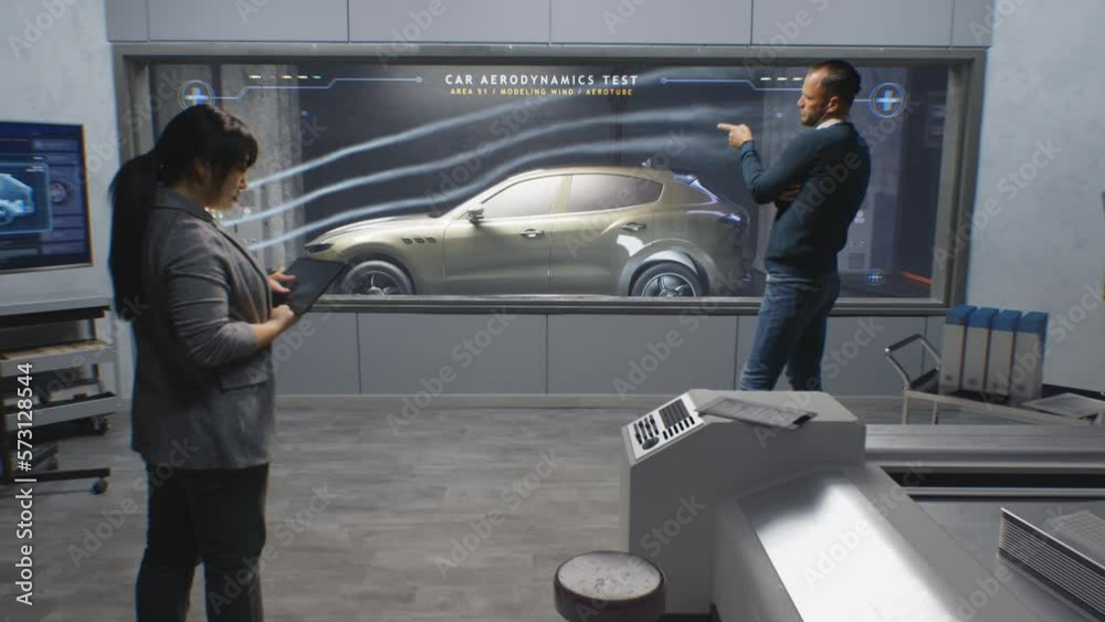 Engineers check aerodynamics of eco-friendly electric car in lab for ...