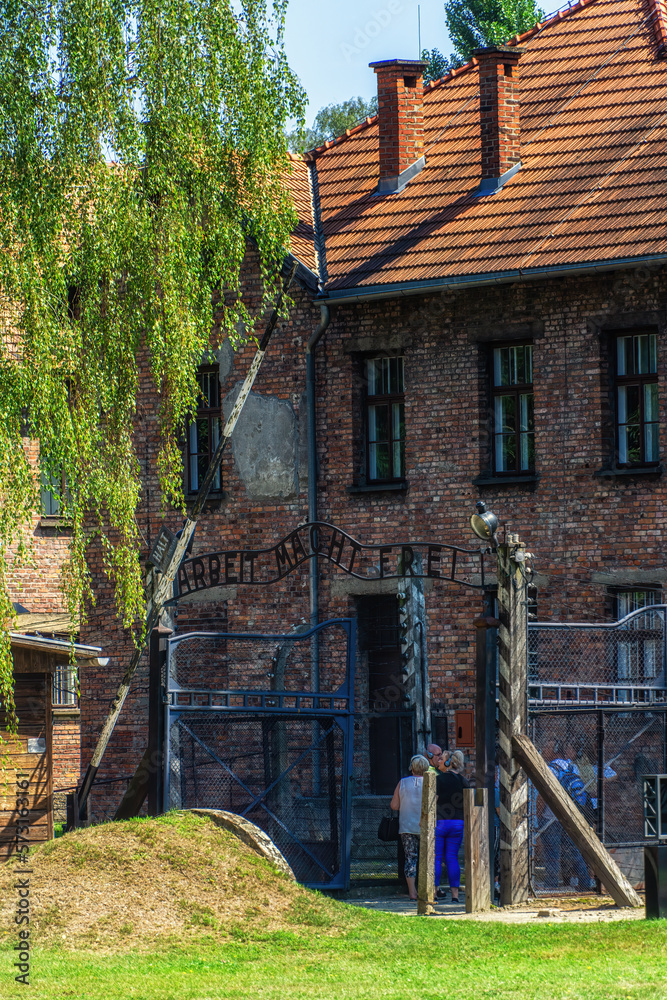 Entrance gate at Auschwitz I with slogan Work sets you free - former ...