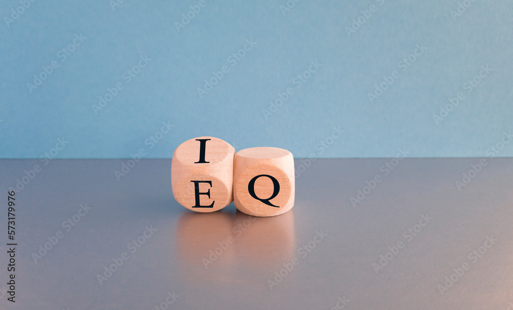 IQ or EQ symbol. Psychologist flips a cube, changes words IQ ...