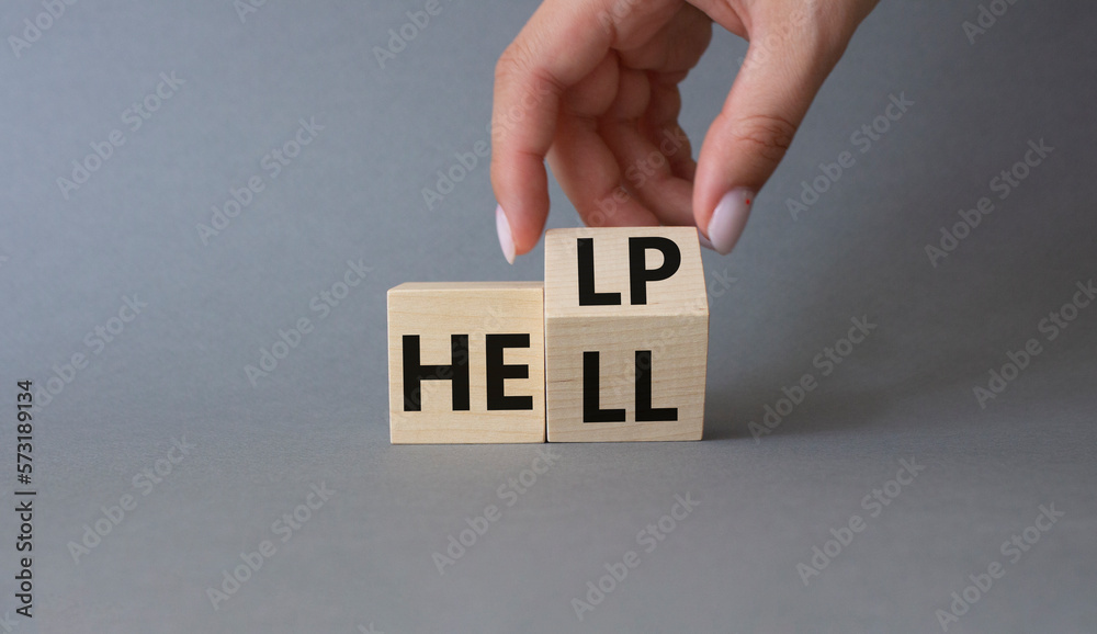 Help vs Hell symbol. Businessman hand Turnes cube and changes word Hell ...