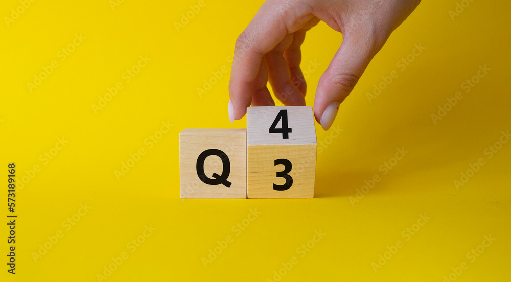 From 3rd Quarter to 4th symbol. Businessman hand Turnes cube and ...