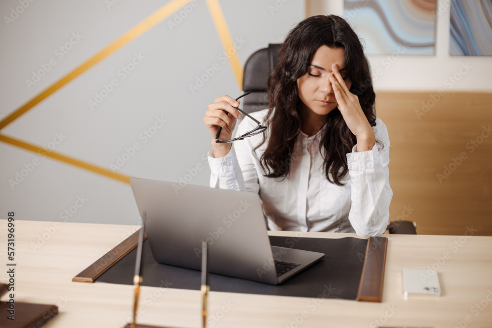 Stressed and angry young indian or arabic business woman having online ...