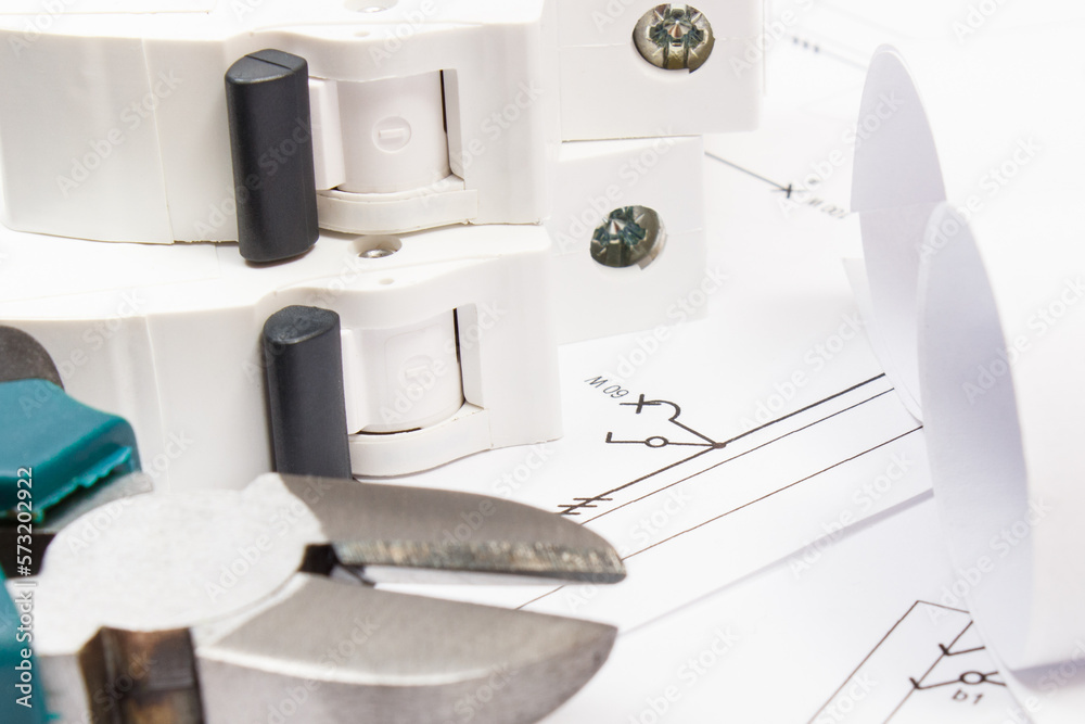 Pliers, electric fuse and diagrams of housing plan with electrical ...